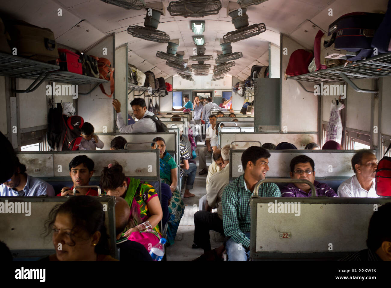 Second class passengers on a local train in Amritsar, India. © Jordi ...