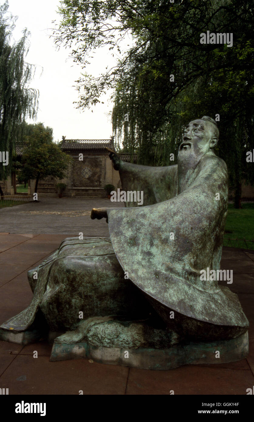 Statue of a Chinese philosopher in a garden at the Chang Mansion in ...