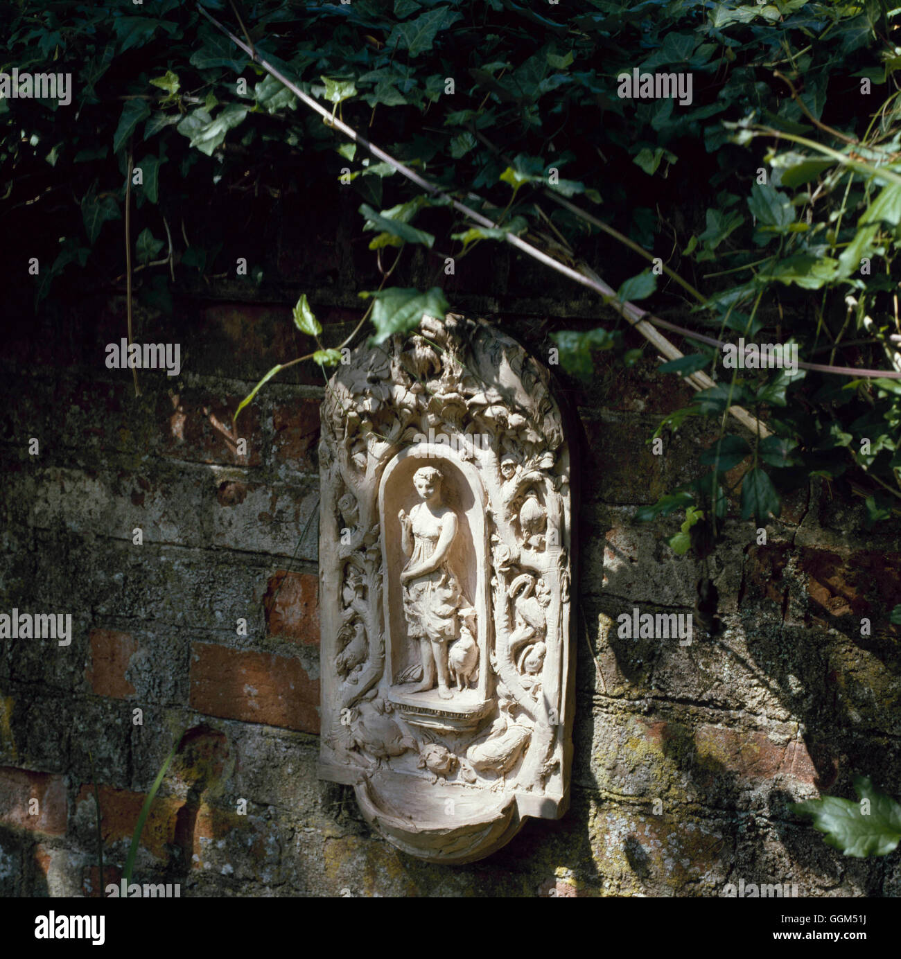 Statue - in the garden of `Chequers' Boxford Suffolk. (Jenny Robinson ...