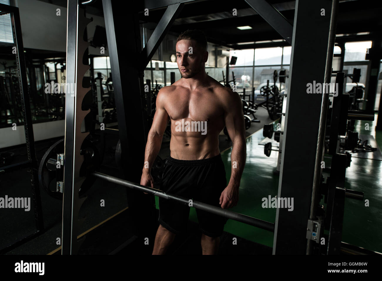 Bodybuilder Posing In Different Poses Demonstrating Their Muscles ...