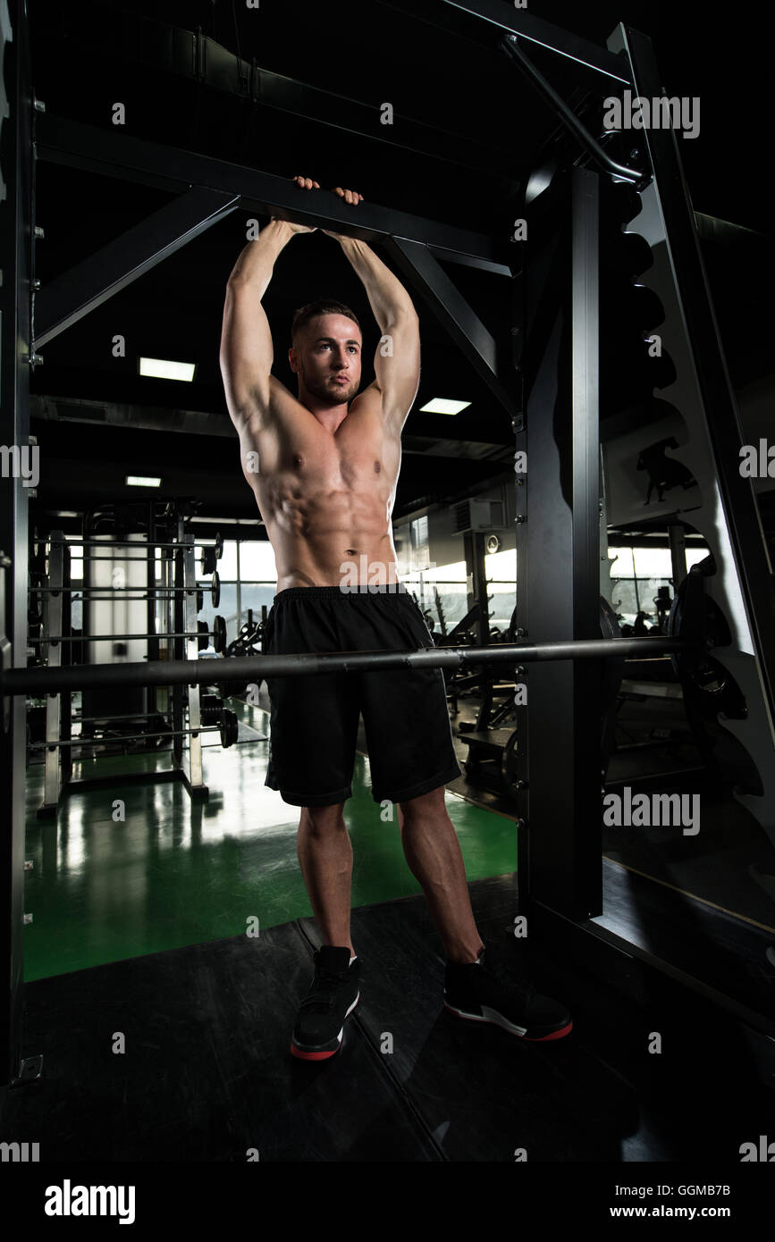 Bodybuilder Posing In Different Poses Demonstrating Their Muscles ...
