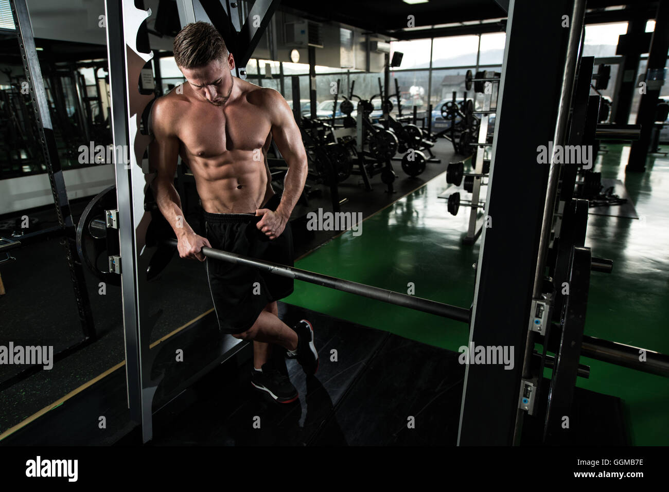 Bodybuilder Posing In Different Poses Demonstrating Their Muscles ...