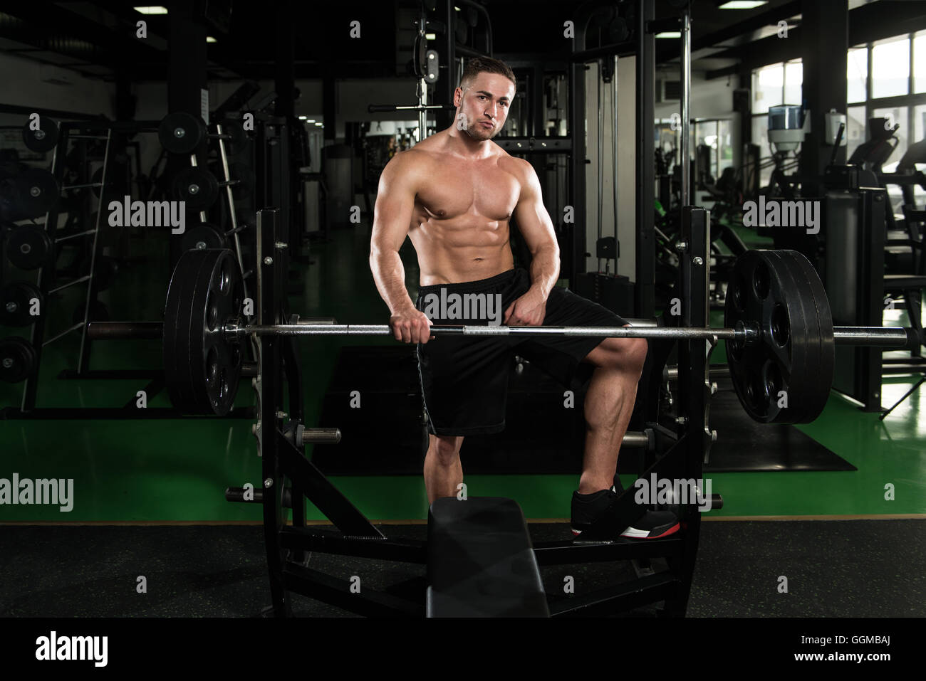 Bodybuilder Posing In Different Poses Demonstrating Their Muscles ...