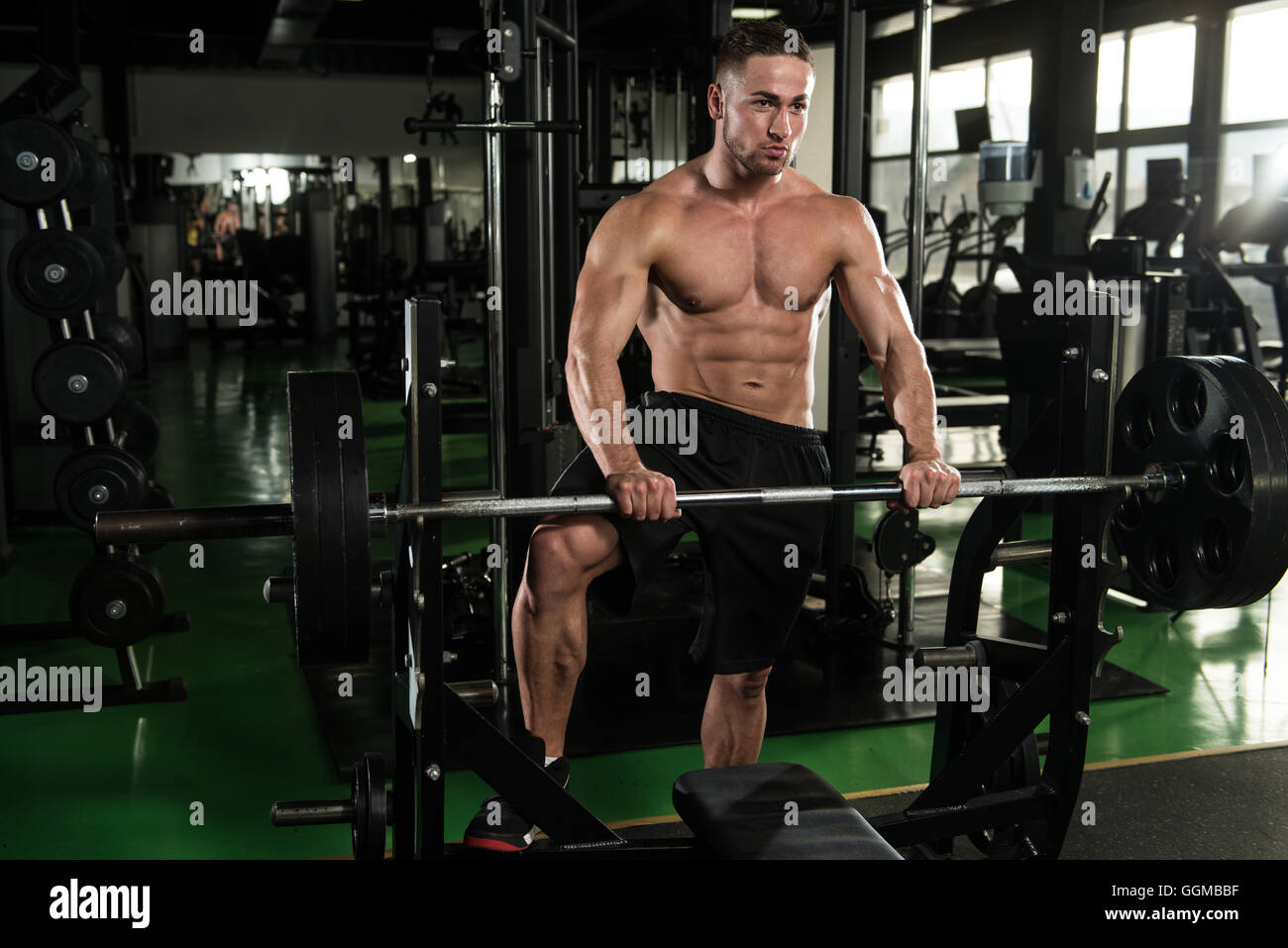 Bodybuilder Posing In Different Poses Demonstrating Their Muscles ...