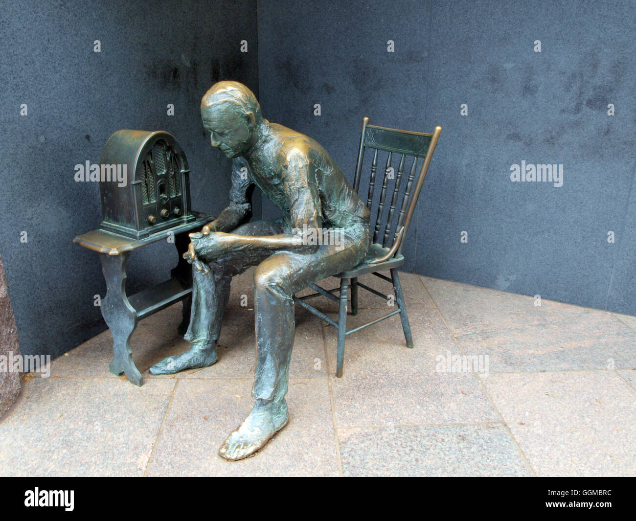 statue of man listening to a radio at the FDR Memorial in Washington, D ...