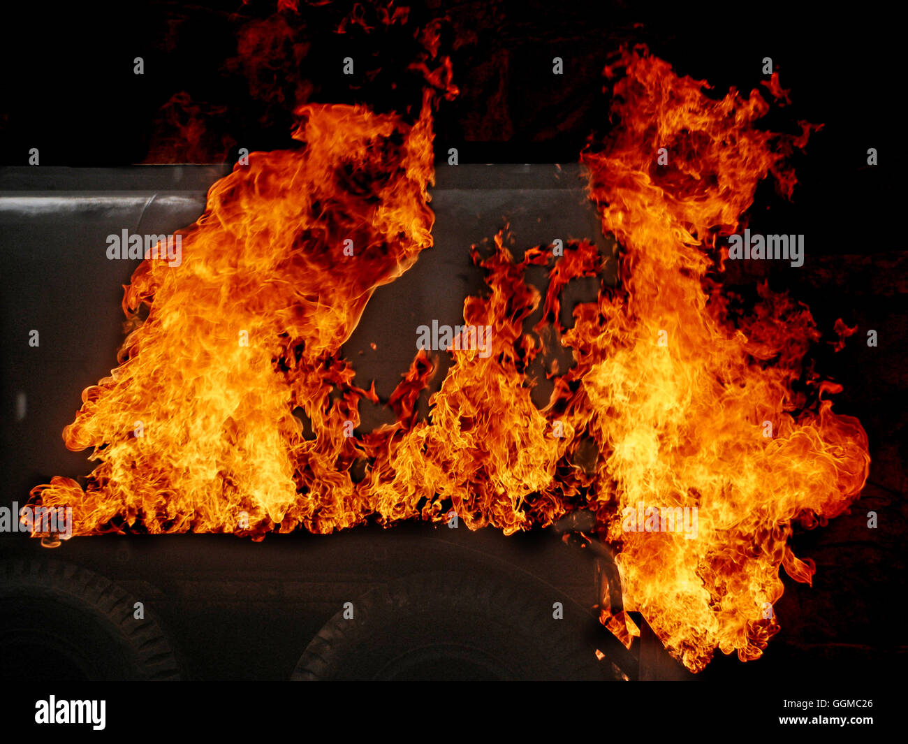 The back on a truck on fire with big flames Stock Photo - Alamy
