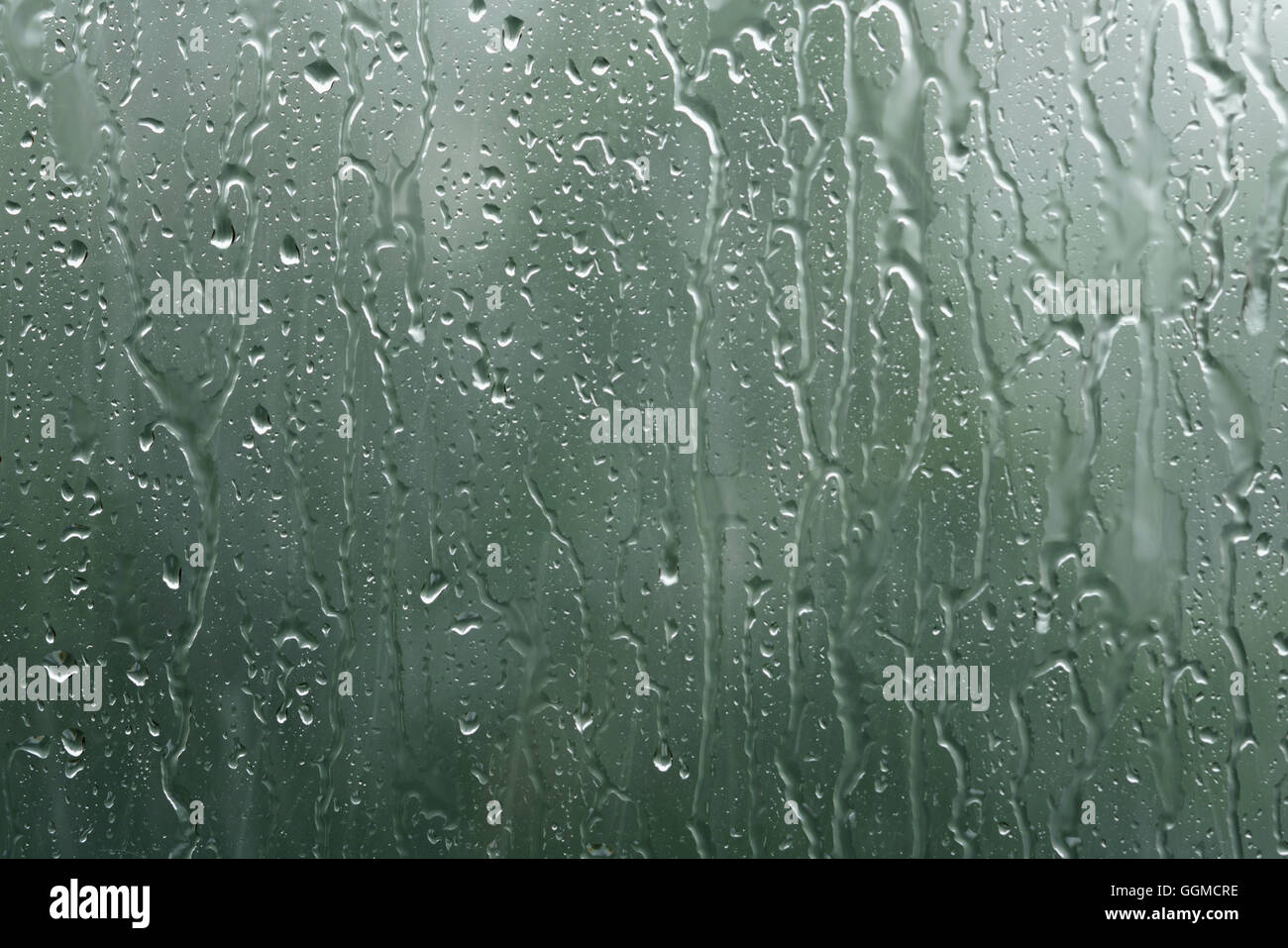 real rain drops on window glass in high resolution Stock Photo - Alamy