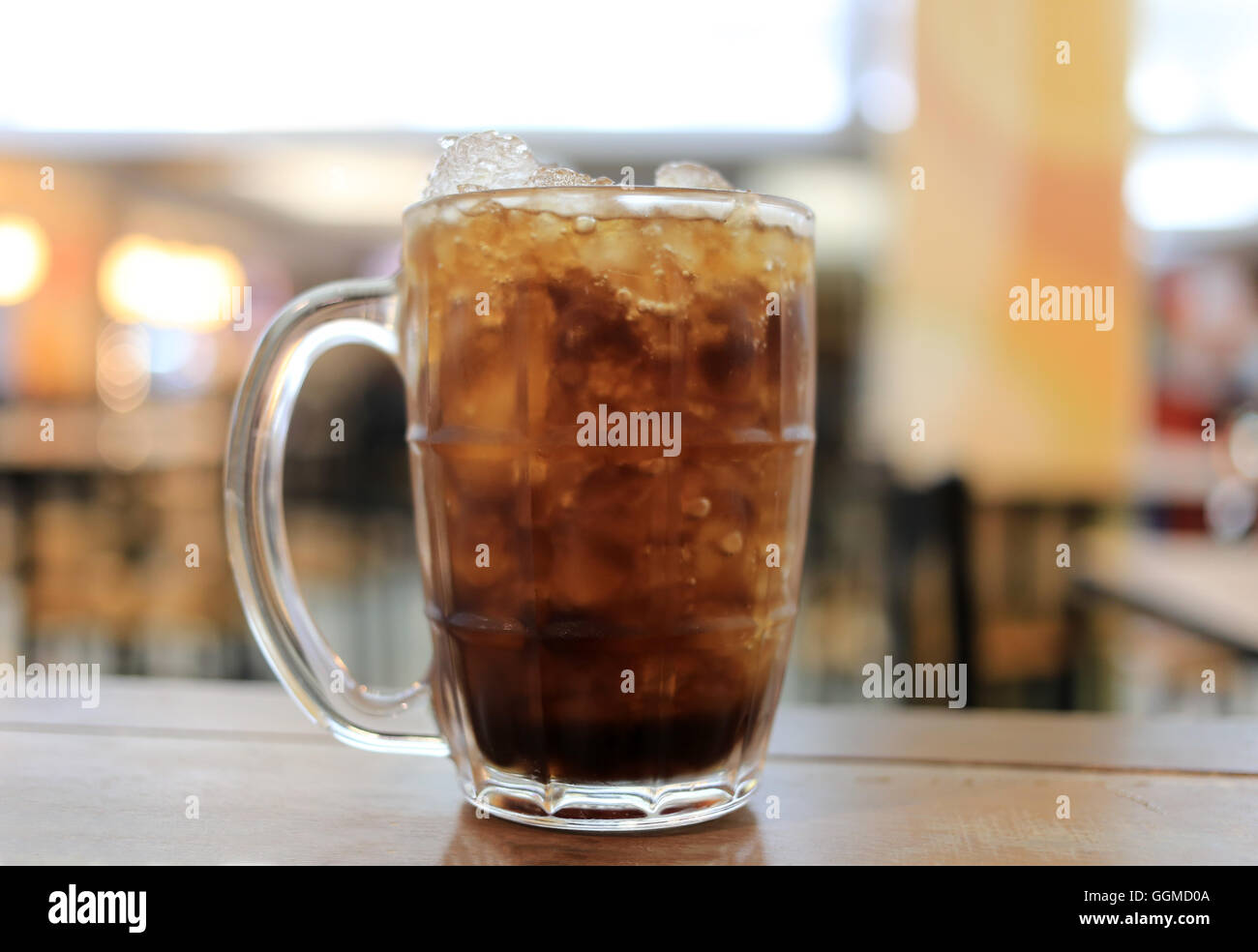 Glass of cola on a table in a restaurant,Soda beverage for quenching ...