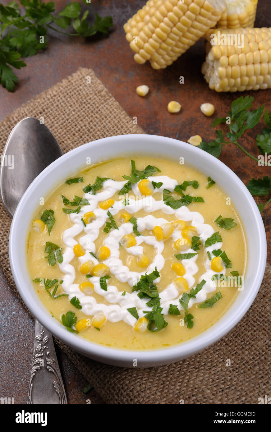 bowl of pureed soup mealies seasoned with grains of corn, parsley and ...