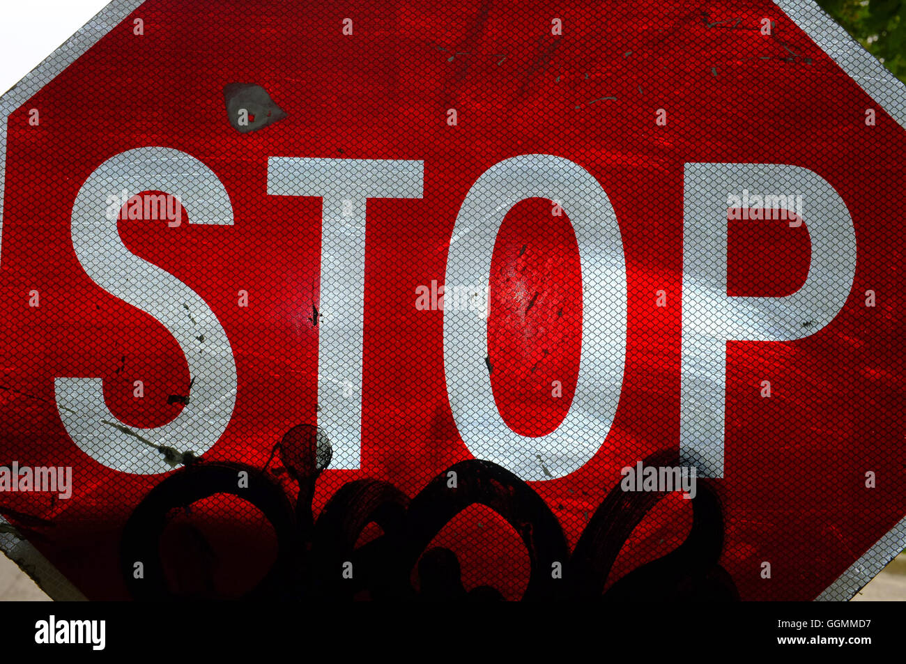 A stop sign with graffiti on it in the Canadian city of London, Ontario ...