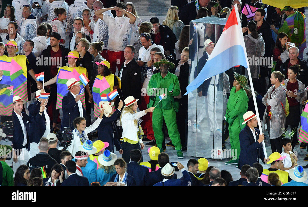 Rio de Janeiro, Brazil. 5th Aug, 2016. Gilles Mueller carries the Flag ...