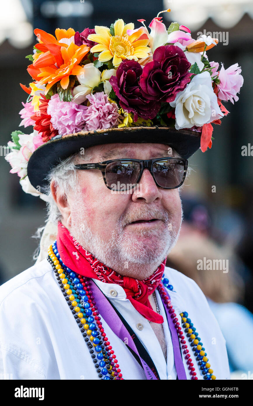 Broadstairs folk week festival. Morris dancer. Marching in parade. Head ...
