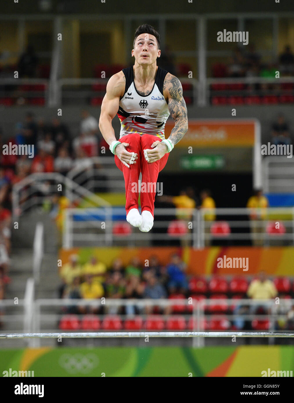 Marcel Nguyen of Germany performs on the horizontal bar during the ...