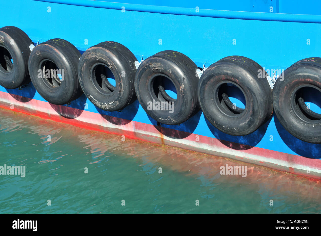 Tug boat tugboat side rubber hi-res stock photography and images - Alamy