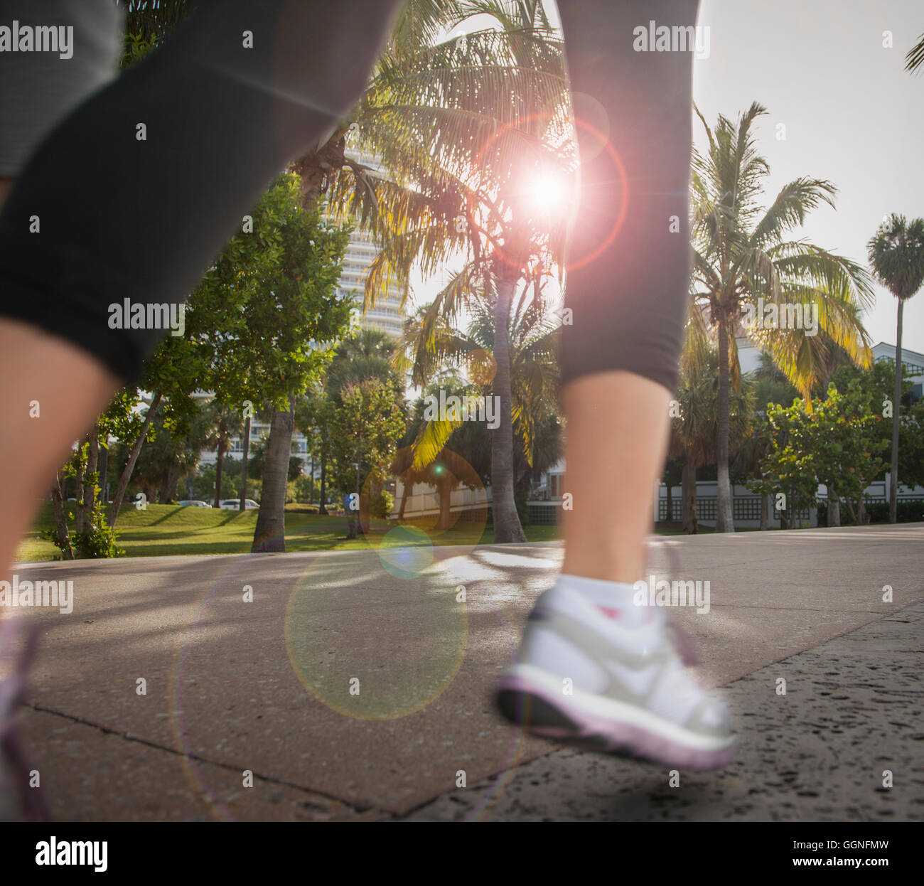 Legs of Caucasian woman jogging in city Stock Photo - Alamy