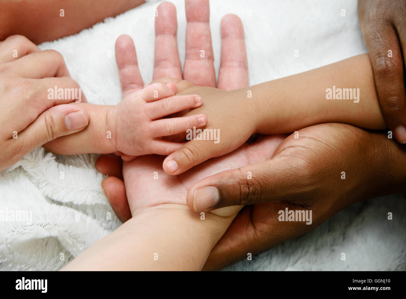 Intertwined and hands hi-res stock photography and images - Alamy