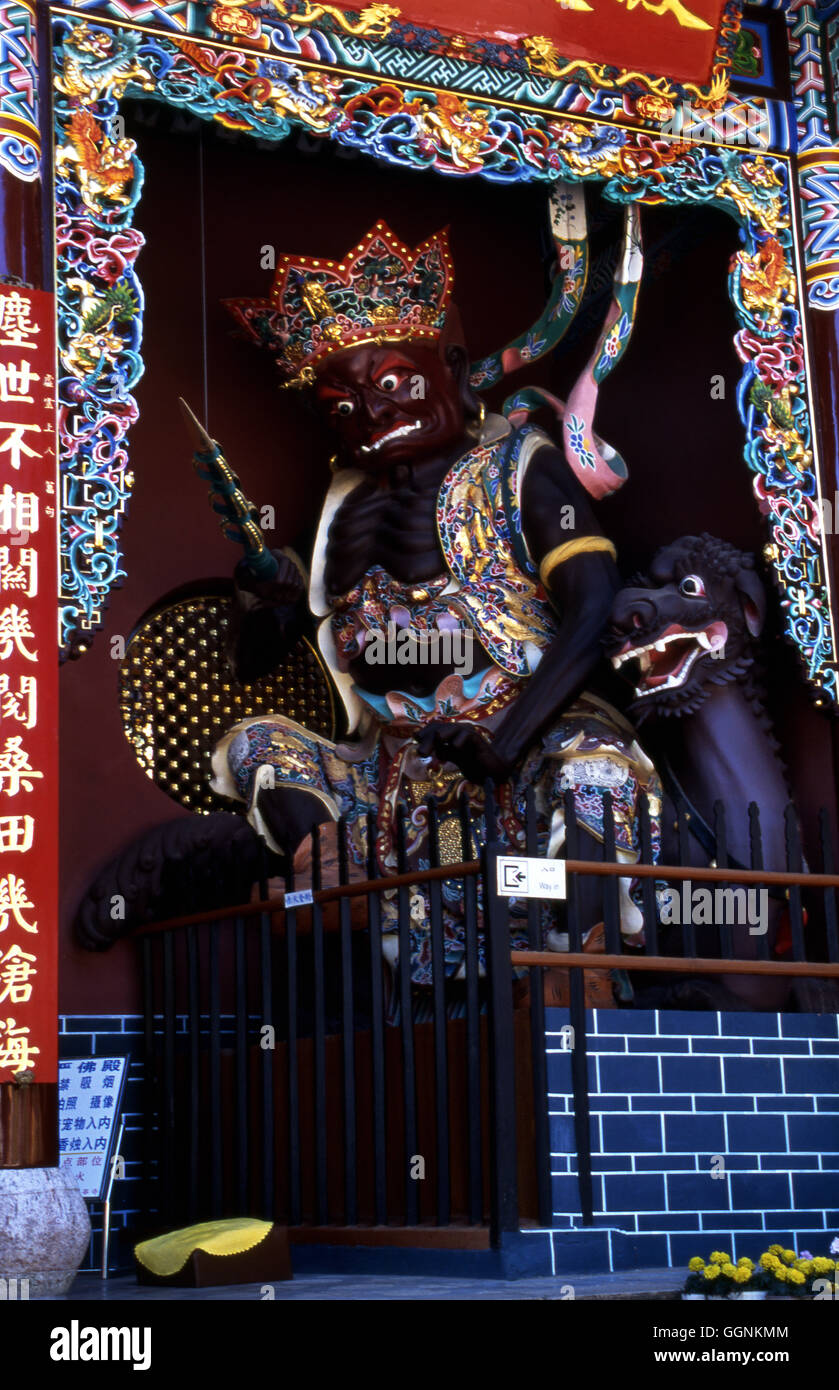 A ferocious god at the entrance to the Huatang Temple. the largest ...