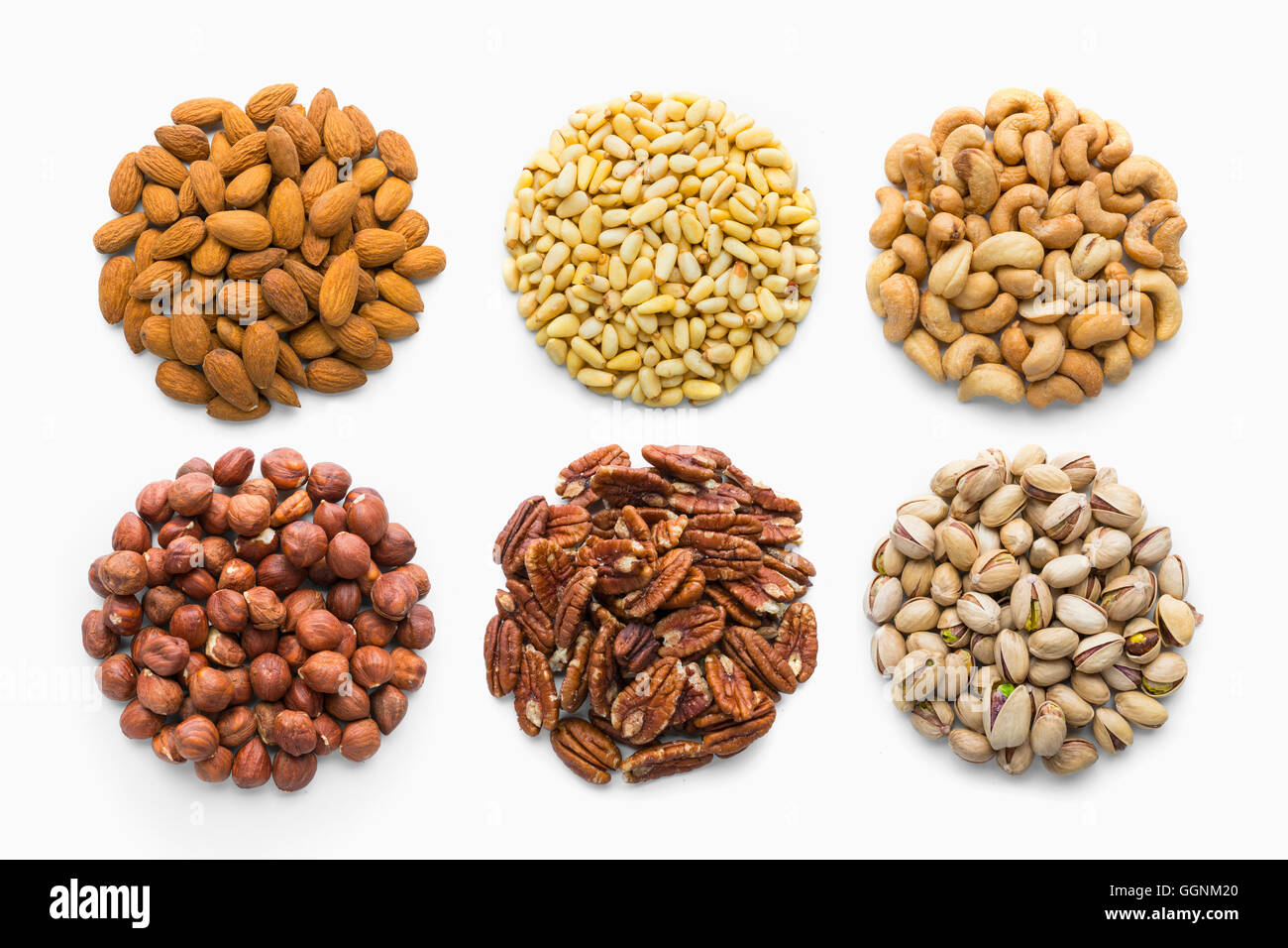 Six piles of nuts Stock Photo - Alamy