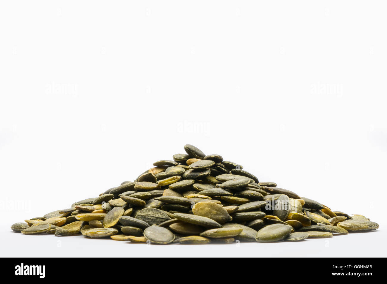 Pile of green seeds Stock Photo - Alamy