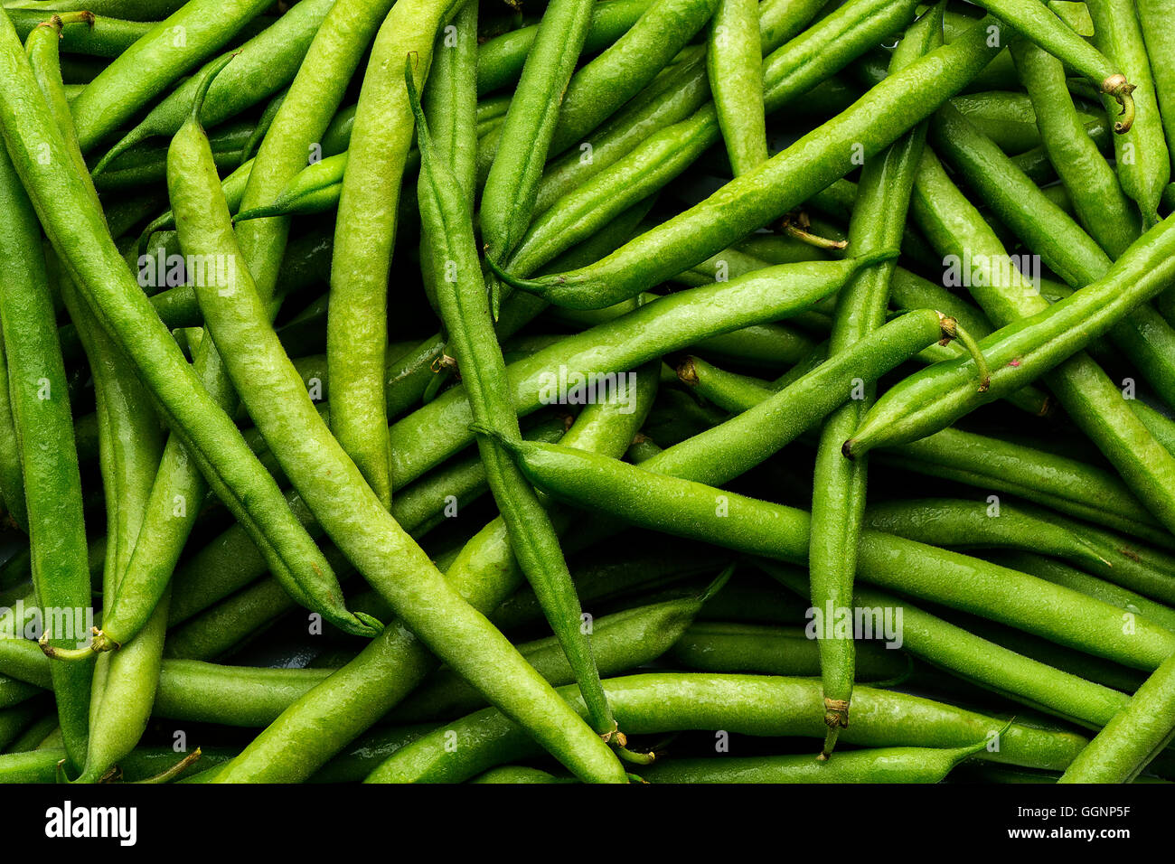 Pile of green string beans Stock Photo - Alamy