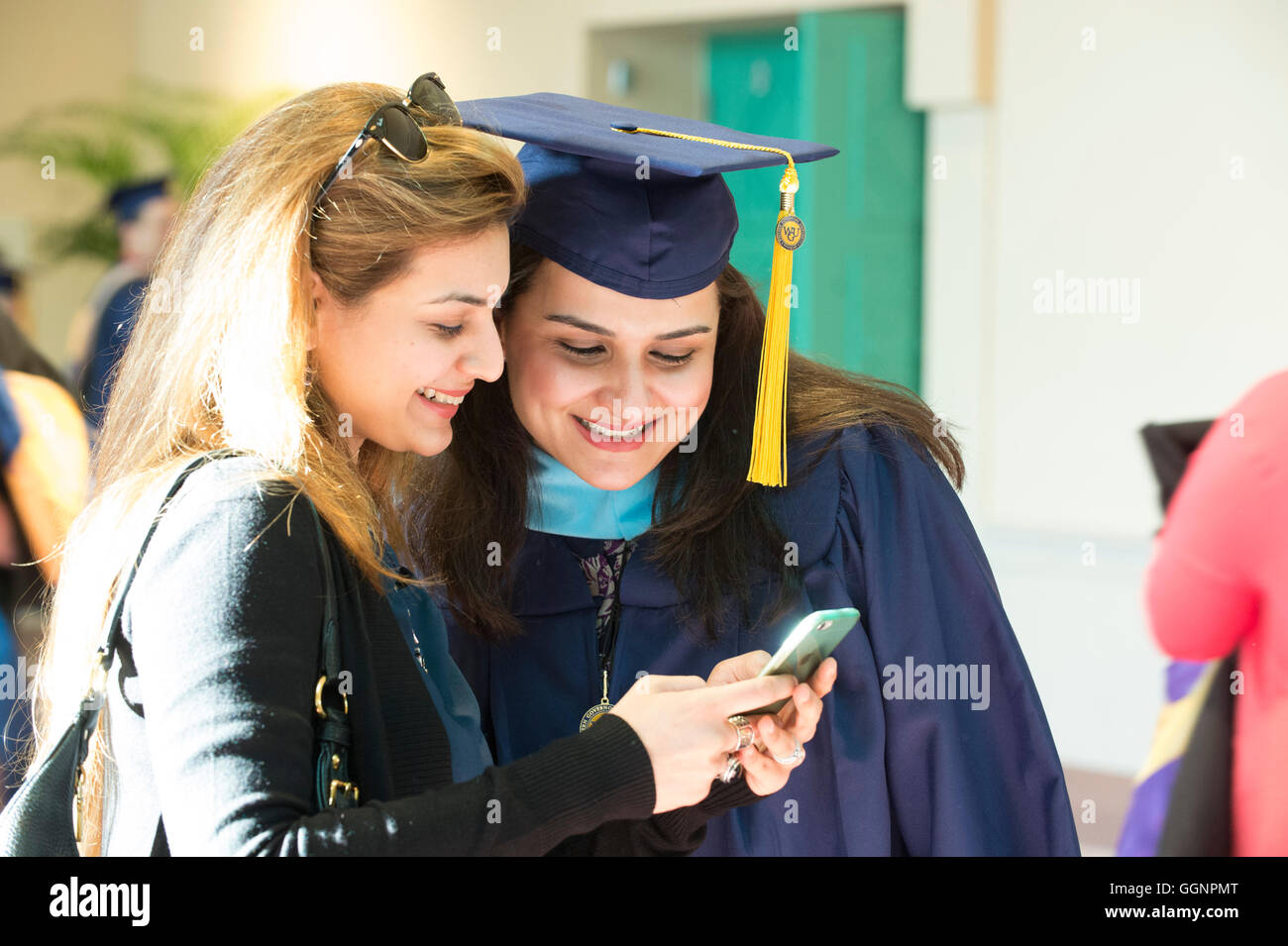 Graduate technology hi-res stock photography and images - Alamy