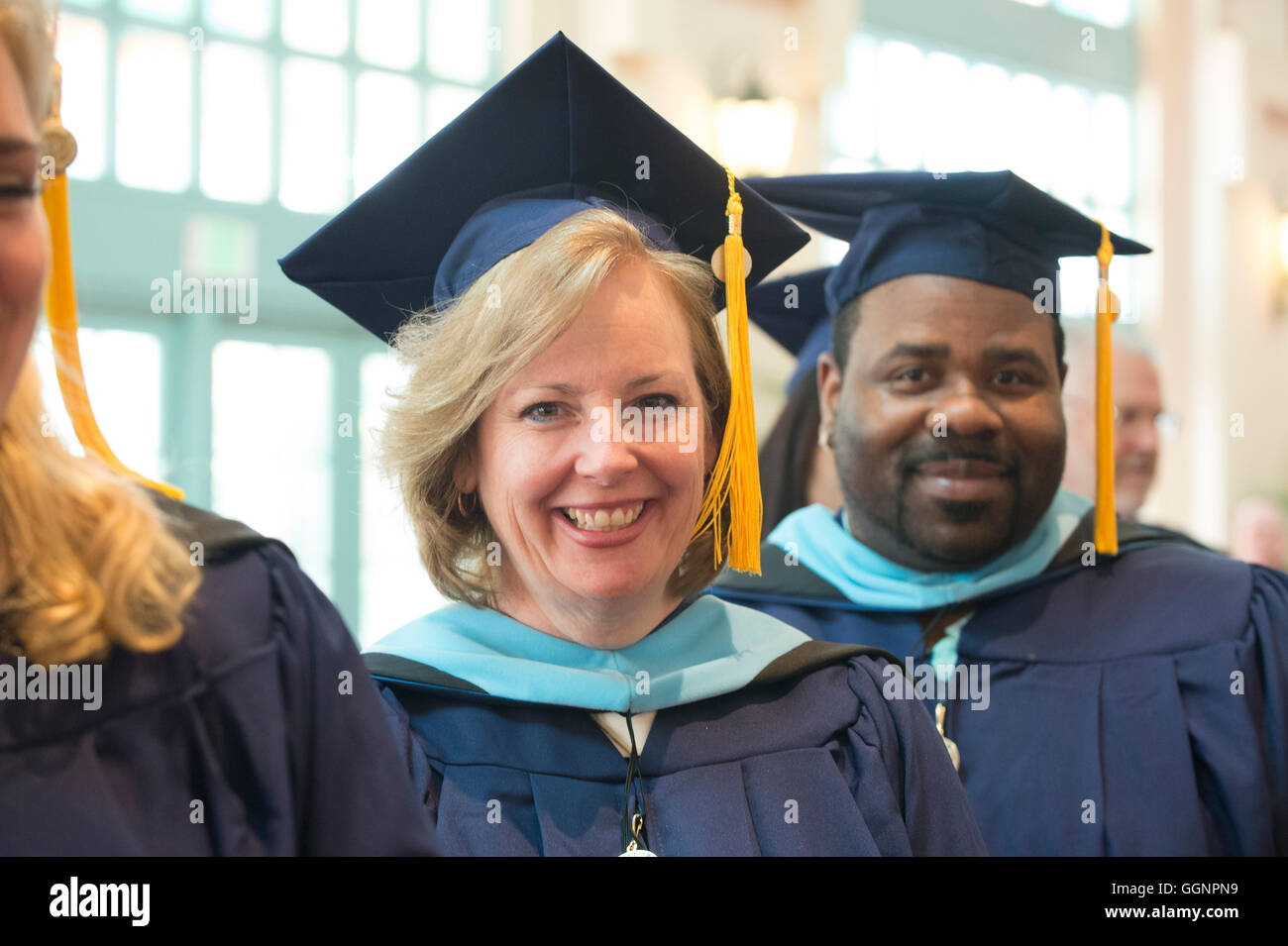 Graduation candidates in caps and gowns wait for Western Governors ...