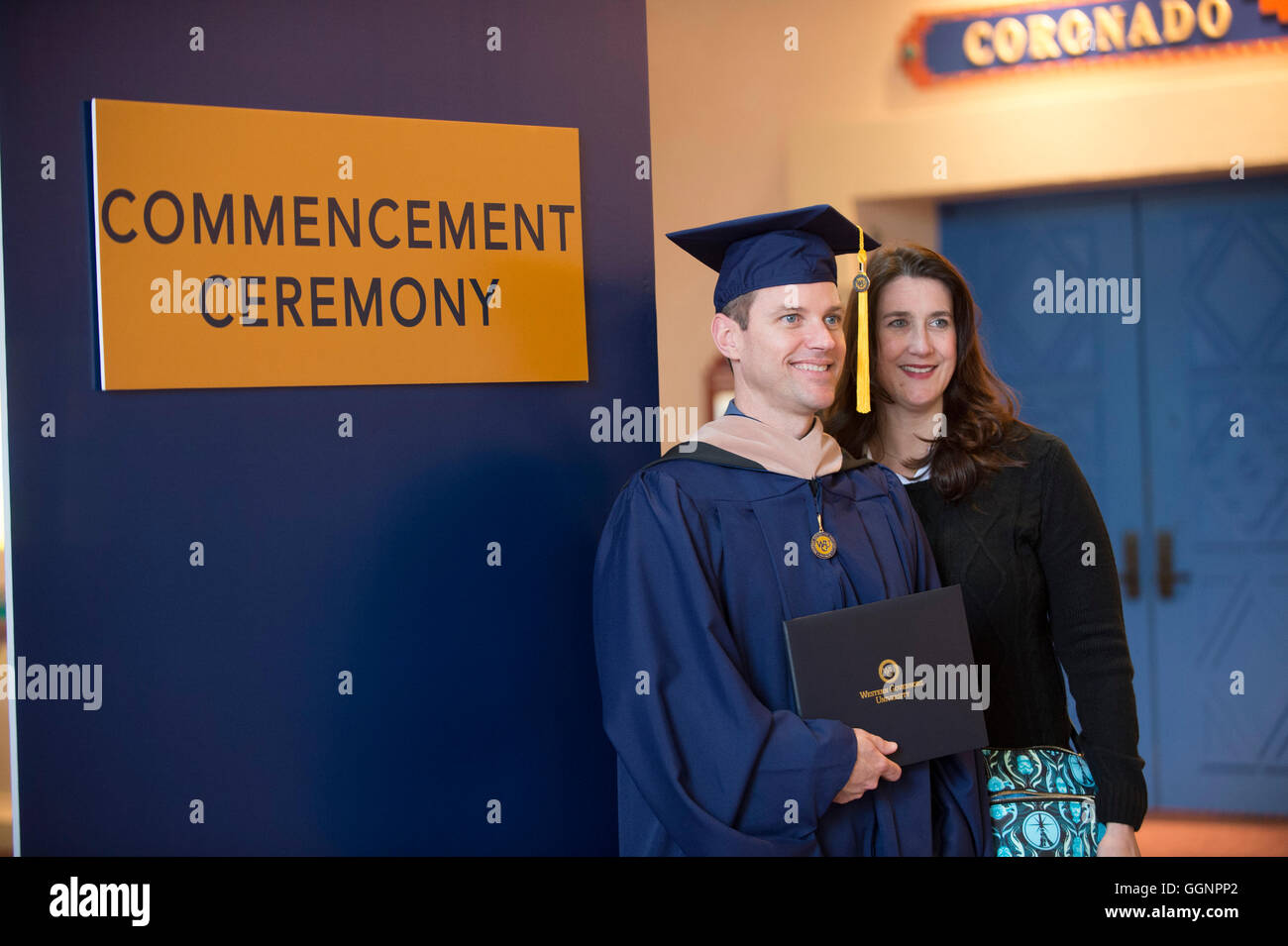 Graduate of Western Governors University poses with friend after ...
