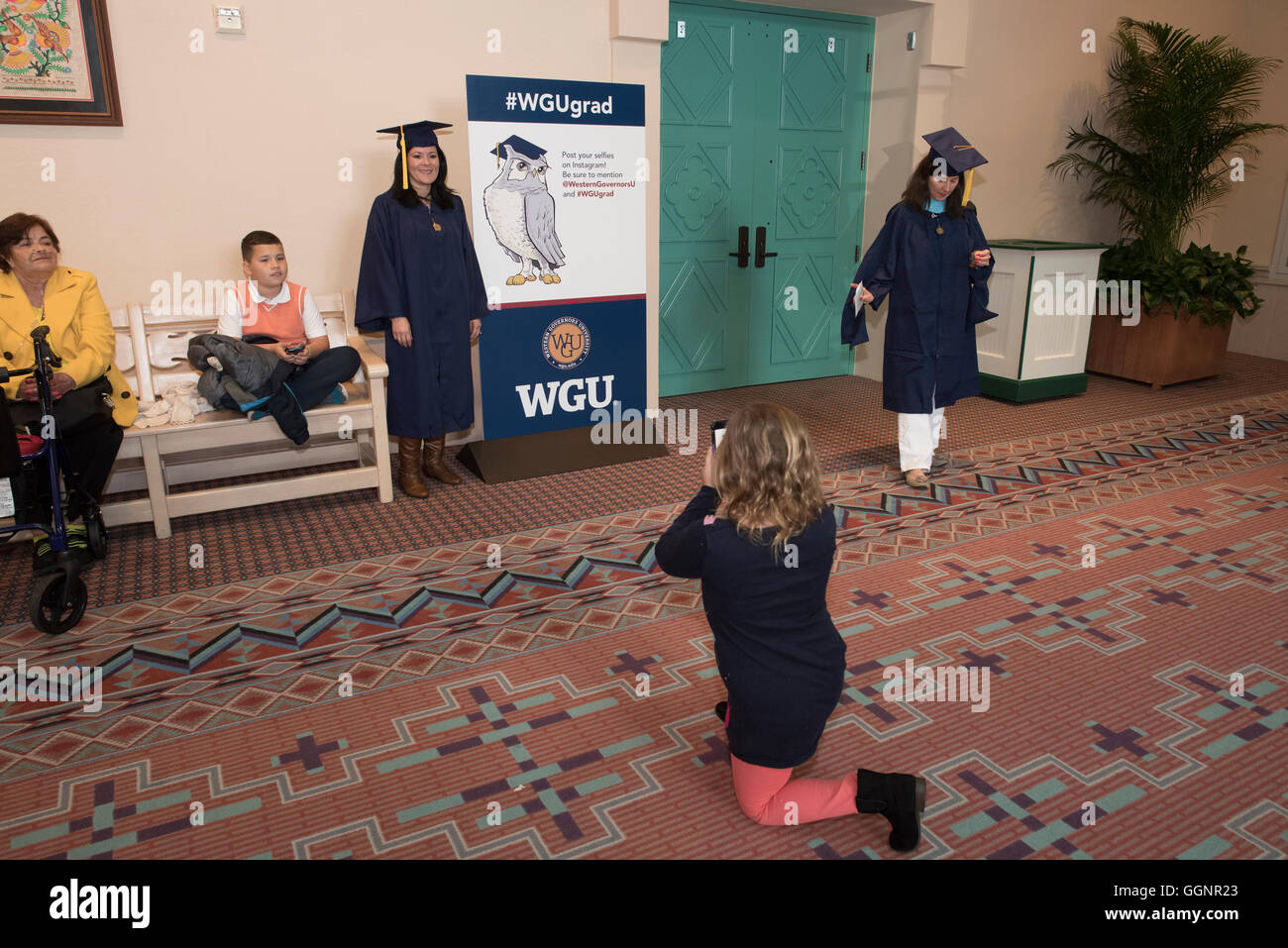 Graduate of Western Governors University poses for picture after ...