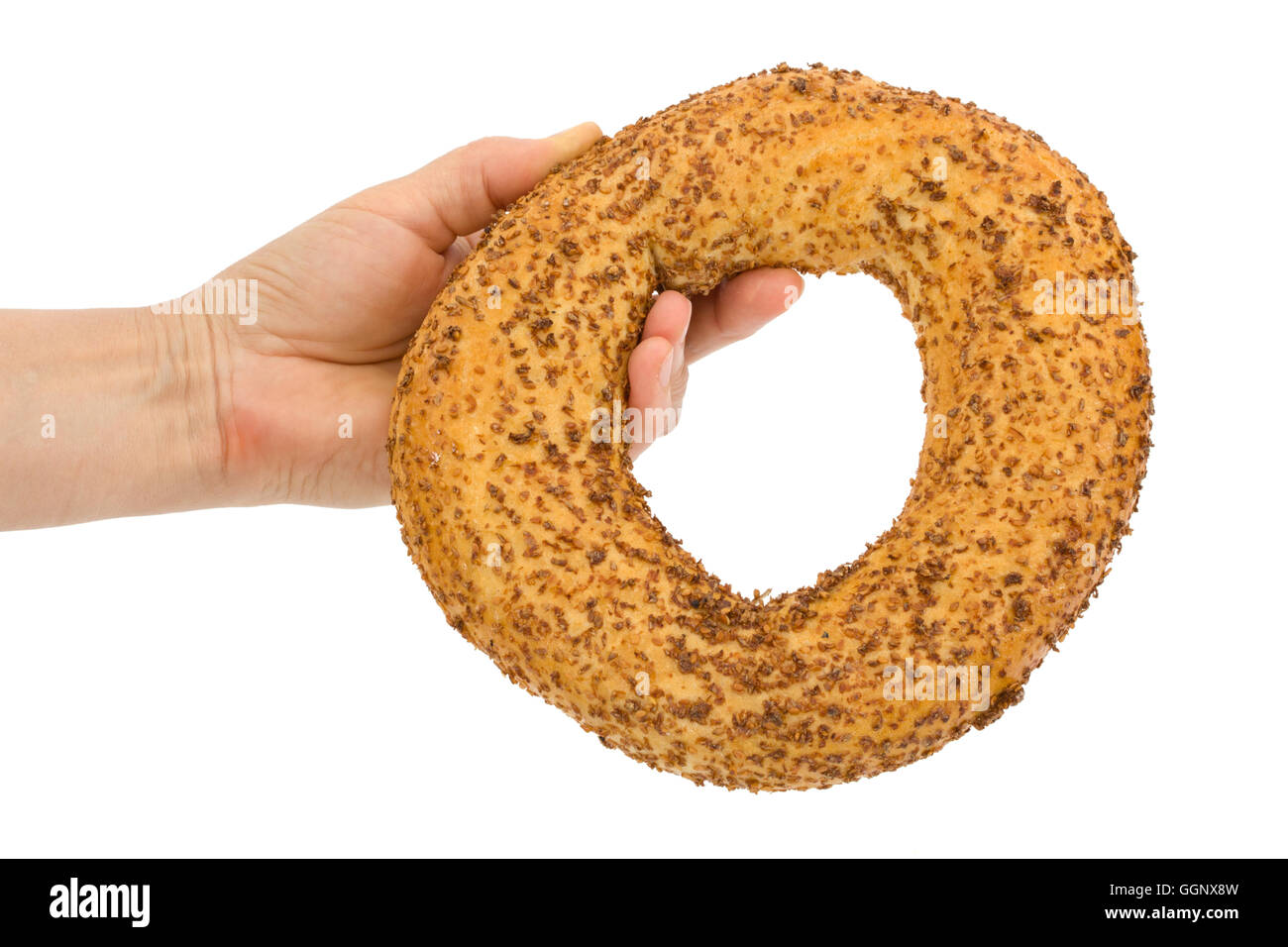 Female hand holding fresh bagel, isolated on white background Stock ...