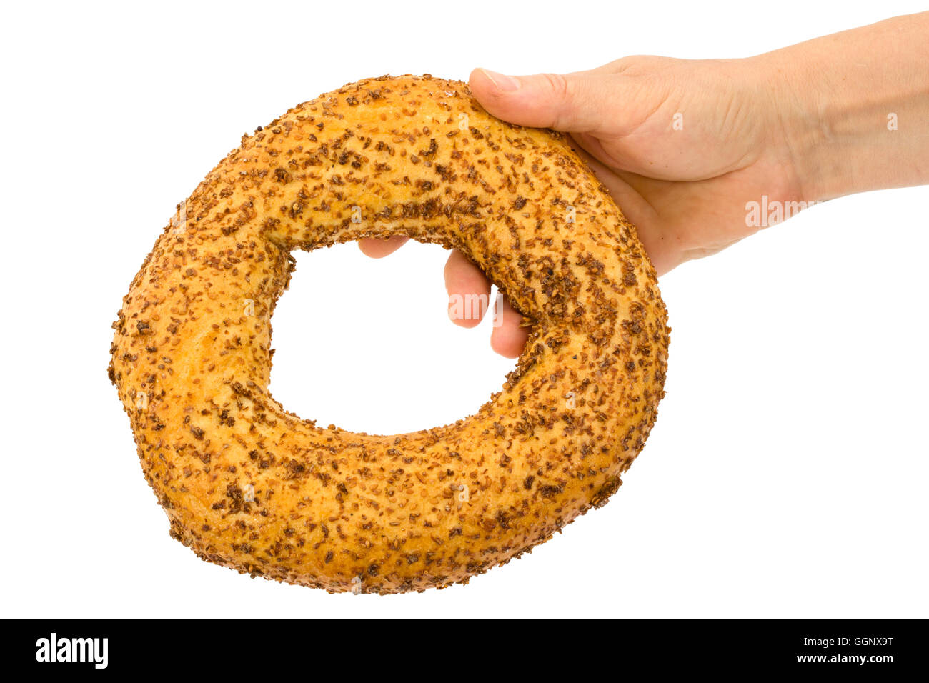 Female hand holding fresh bagel, isolated on white background Stock ...
