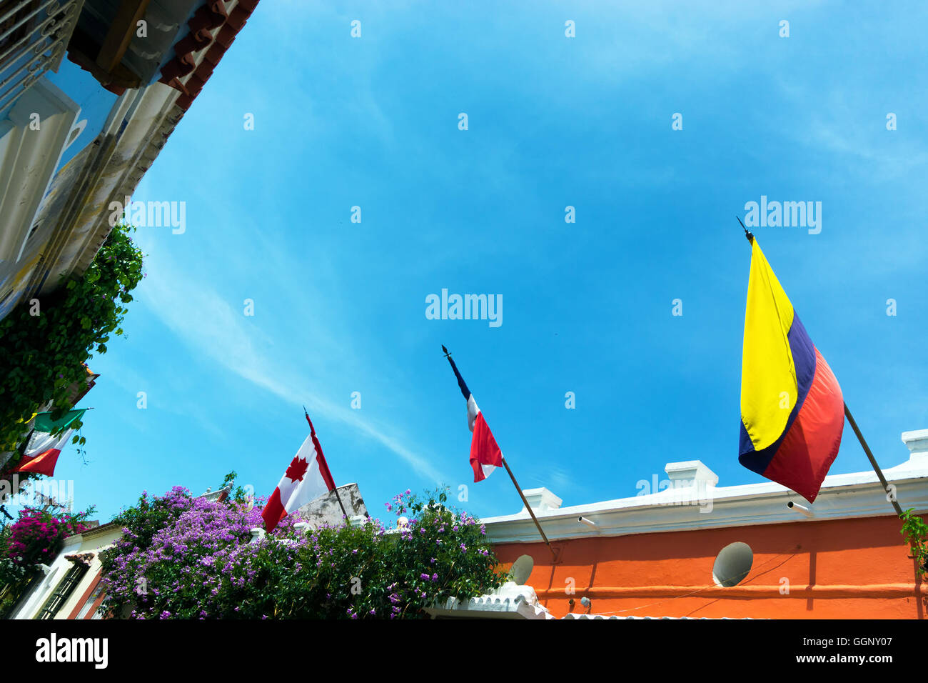 Rows of flags on colonial buildings in Cartagena, Colombia Stock Photo ...