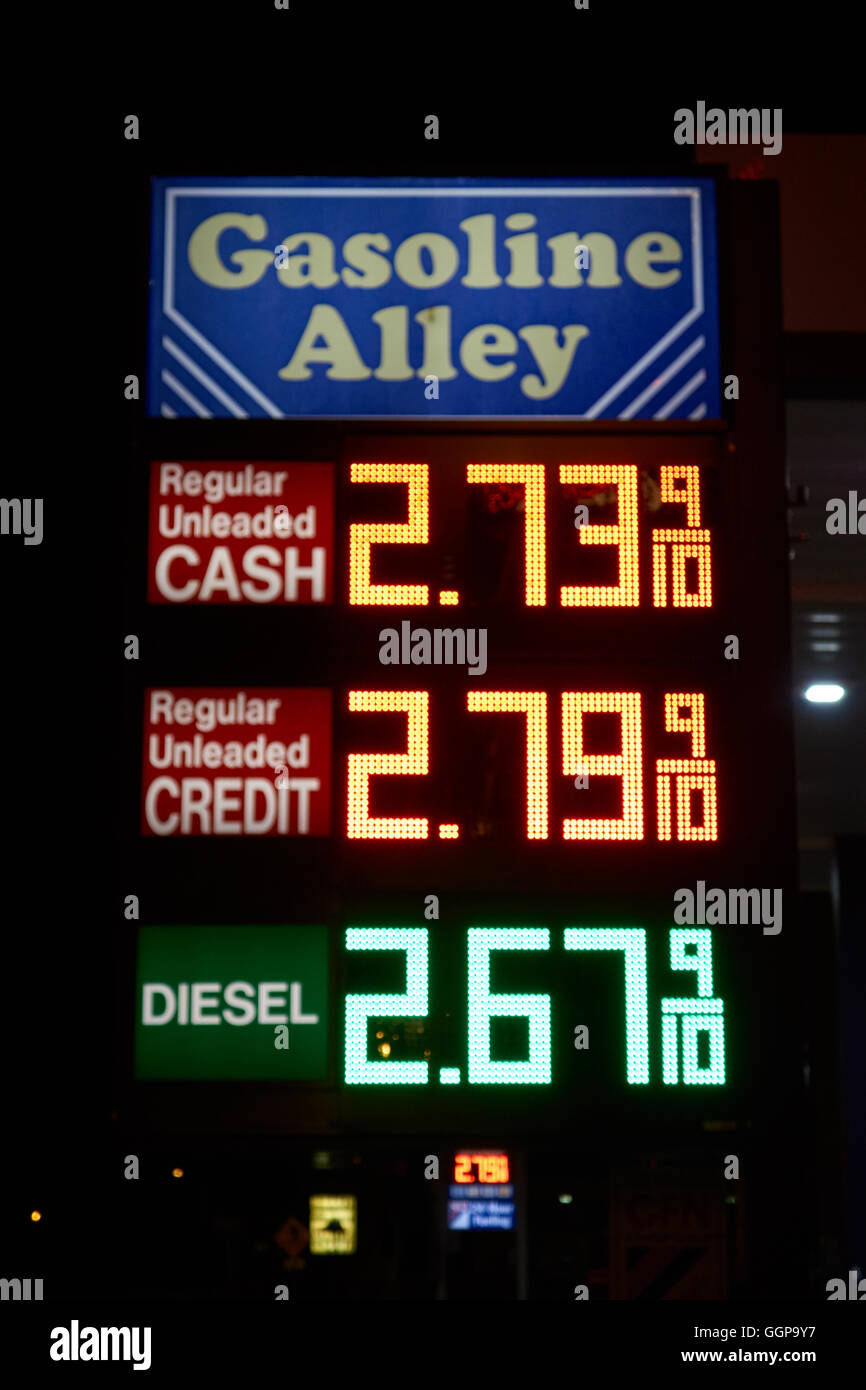 Electronic gas price board lit up at night. USA 2016 Stock Photo - Alamy