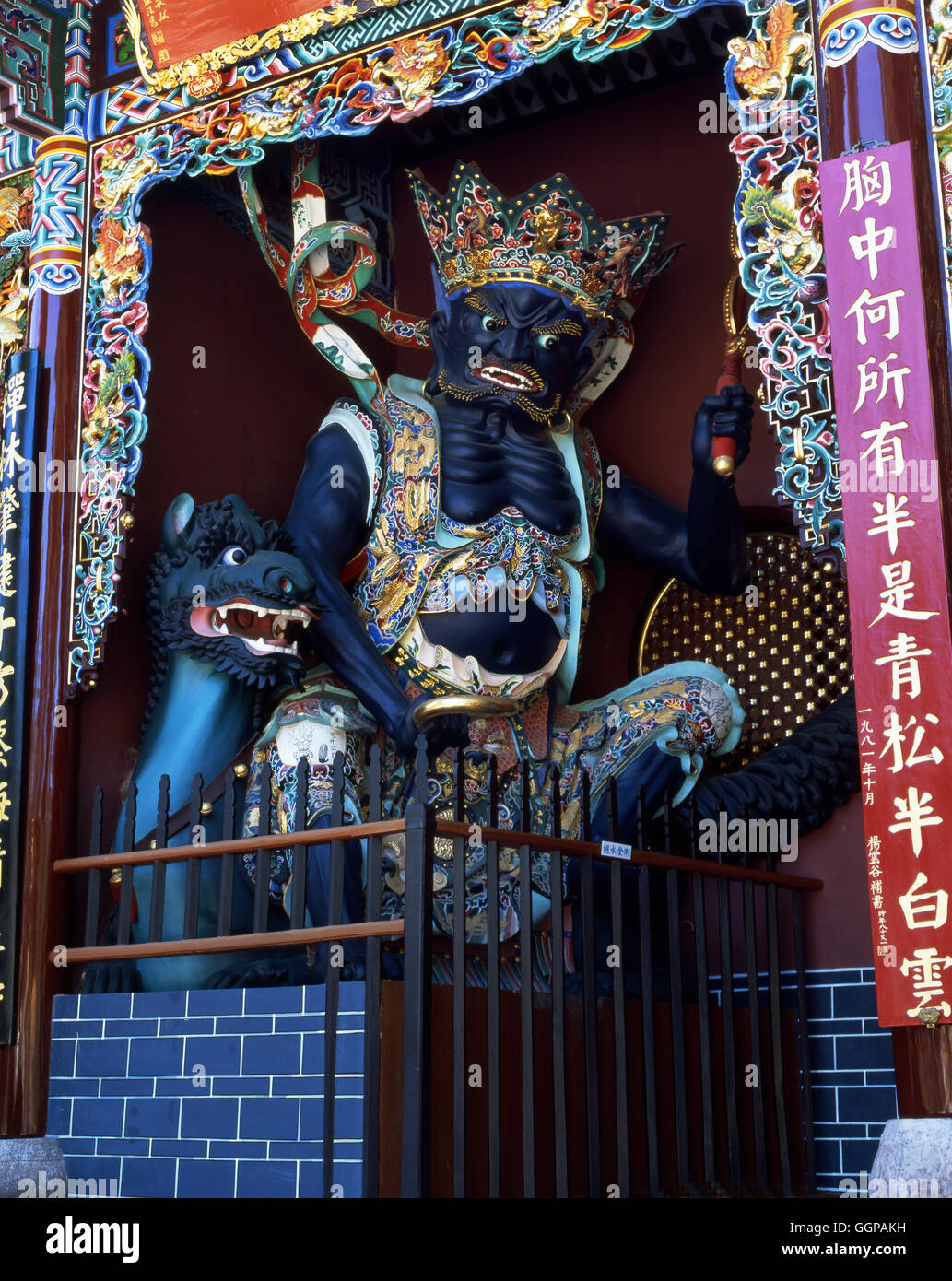 A ferocious god at the entrance to the Huatang Temple. the largest ...