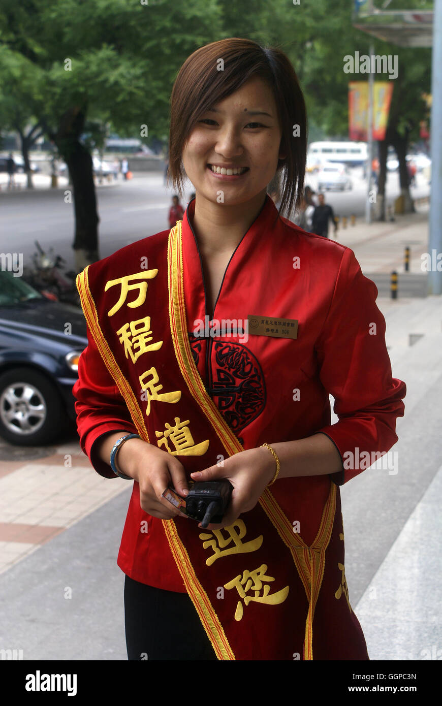 Receptionist at a health spa attached to the Huafu International Hotel ...