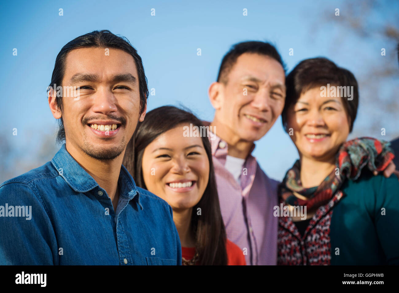 Happy young chinese family hi-res stock photography and images - Alamy