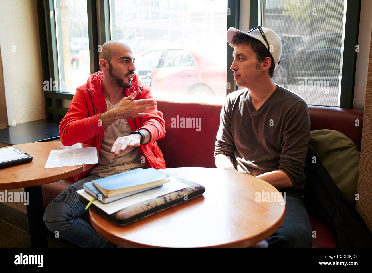 Two friends talking serious hi-res stock photography and images - Alamy