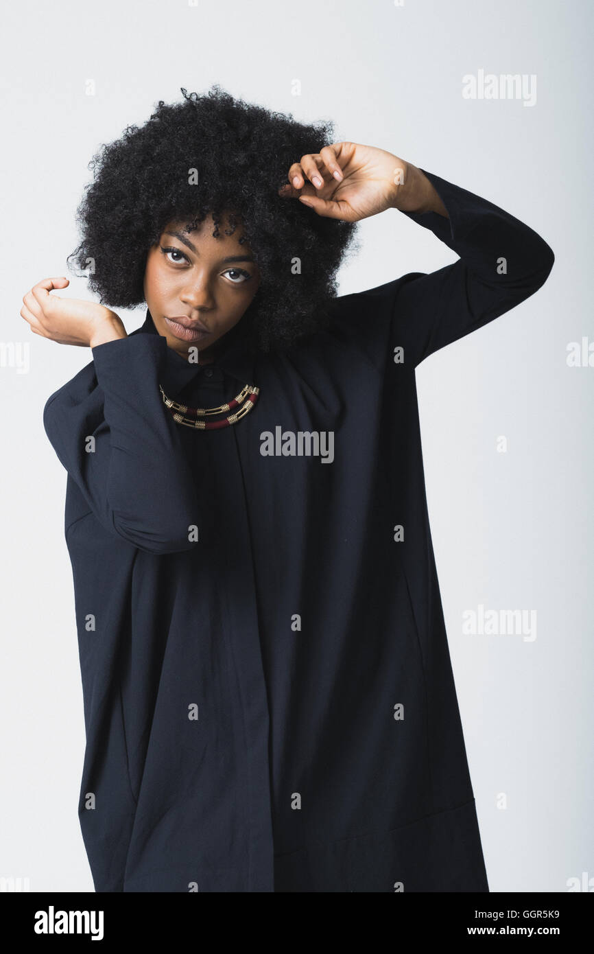 An Afro Caribbean model in her 20s creatign shapes during a fashion ...