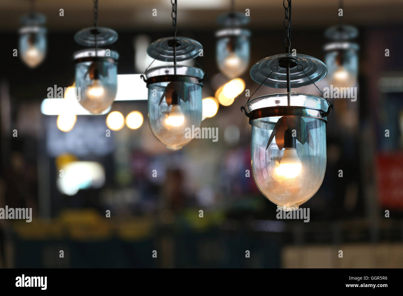 Warm lighting modern ceiling lamps in the cafe and interior decoration ...