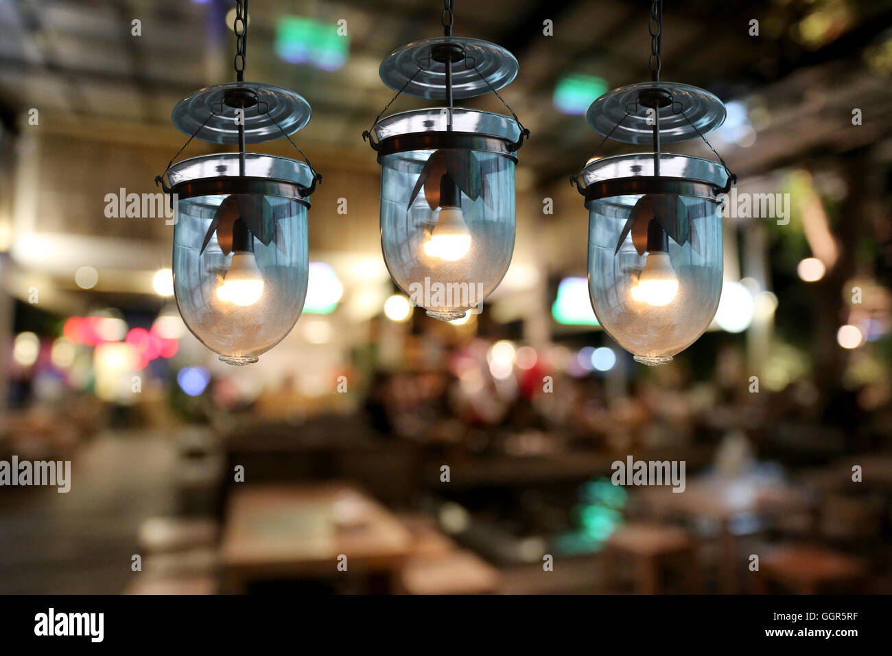 Warm lighting modern ceiling lamps in the cafe and interior decoration ...