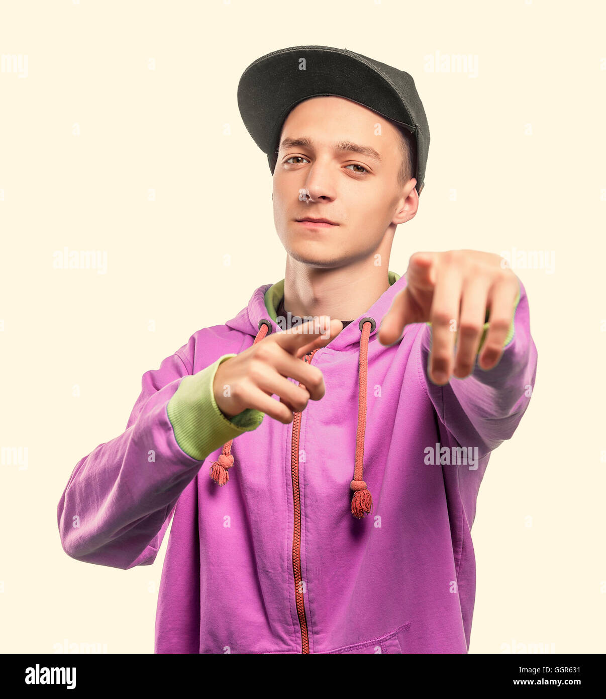 Party-goer in blue dress makes signs with his hands. Toned photo Stock ...