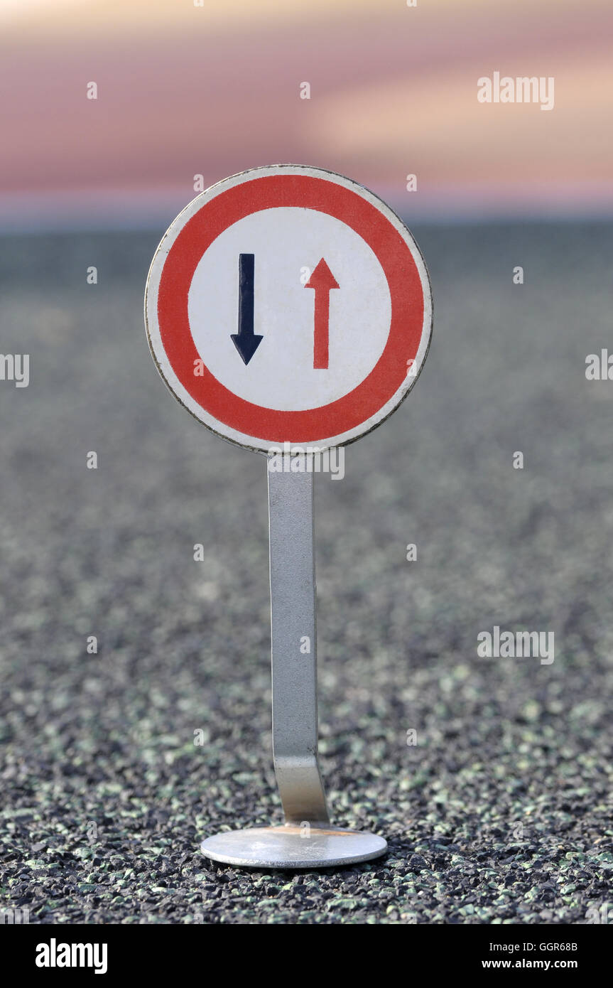 Attention in both directions, double direction traffic sign Stock Photo ...