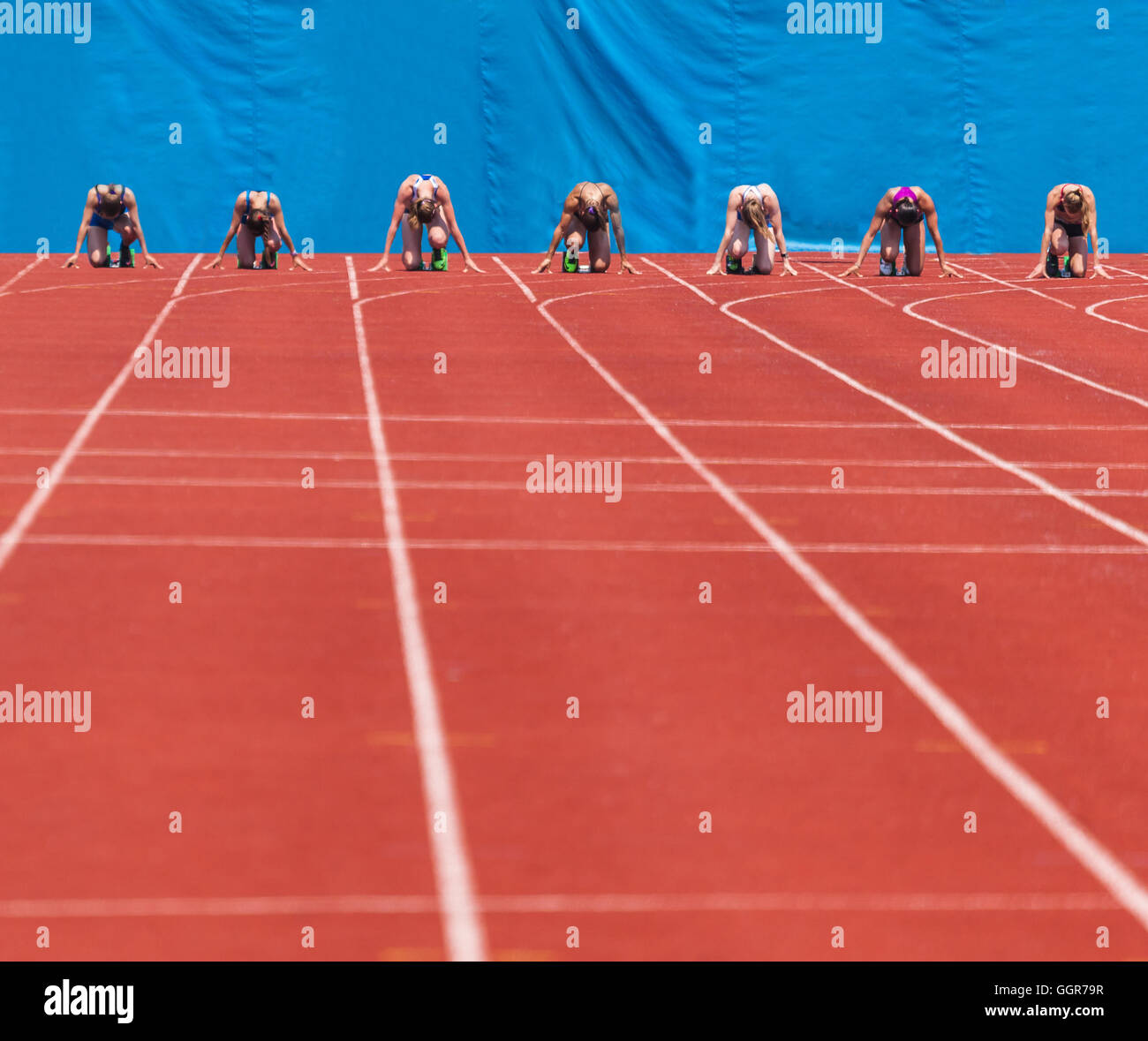 Sprinter getting ready to start the race Stock Photo - Alamy