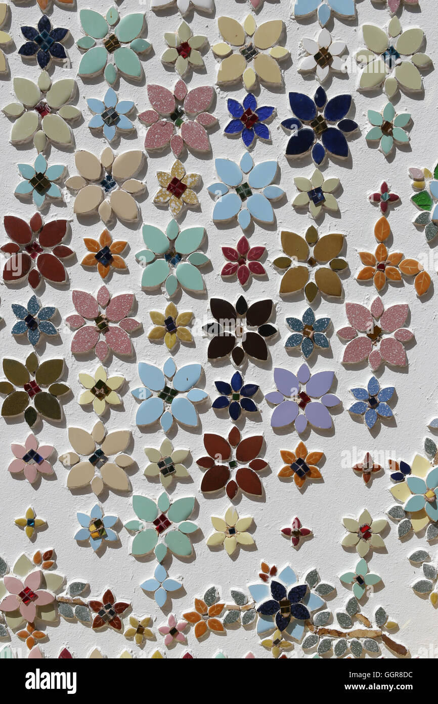 Tile-shaped flowers on the wall for the design background Stock Photo ...