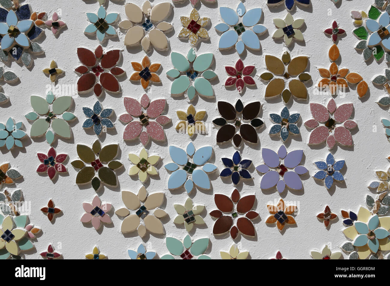 Tile-shaped flowers on the wall for the design background Stock Photo ...