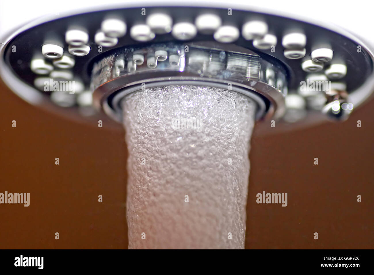 Water Spraying out of the faucet Stock Photo - Alamy