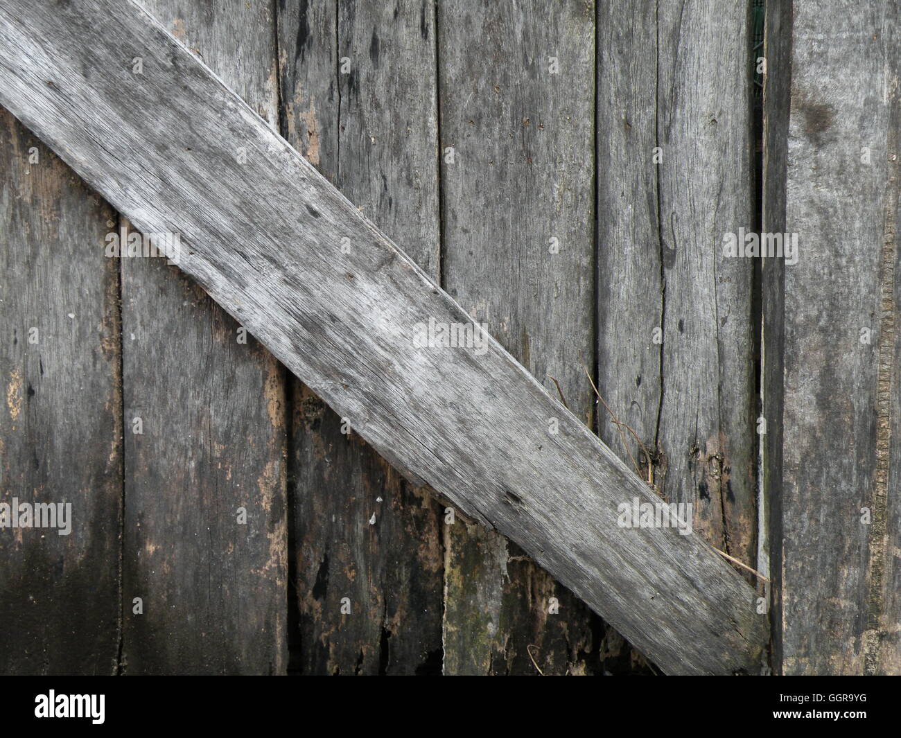 Old wood gate going to decay Stock Photo - Alamy