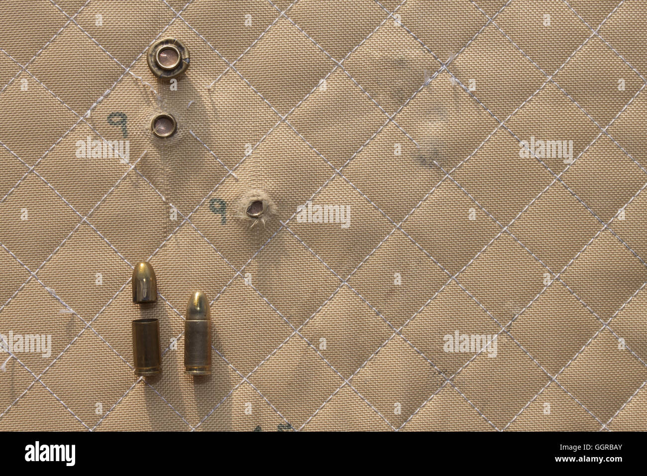 hit shot 9mm in Kevlar bulletproof vest Stock Photo - Alamy