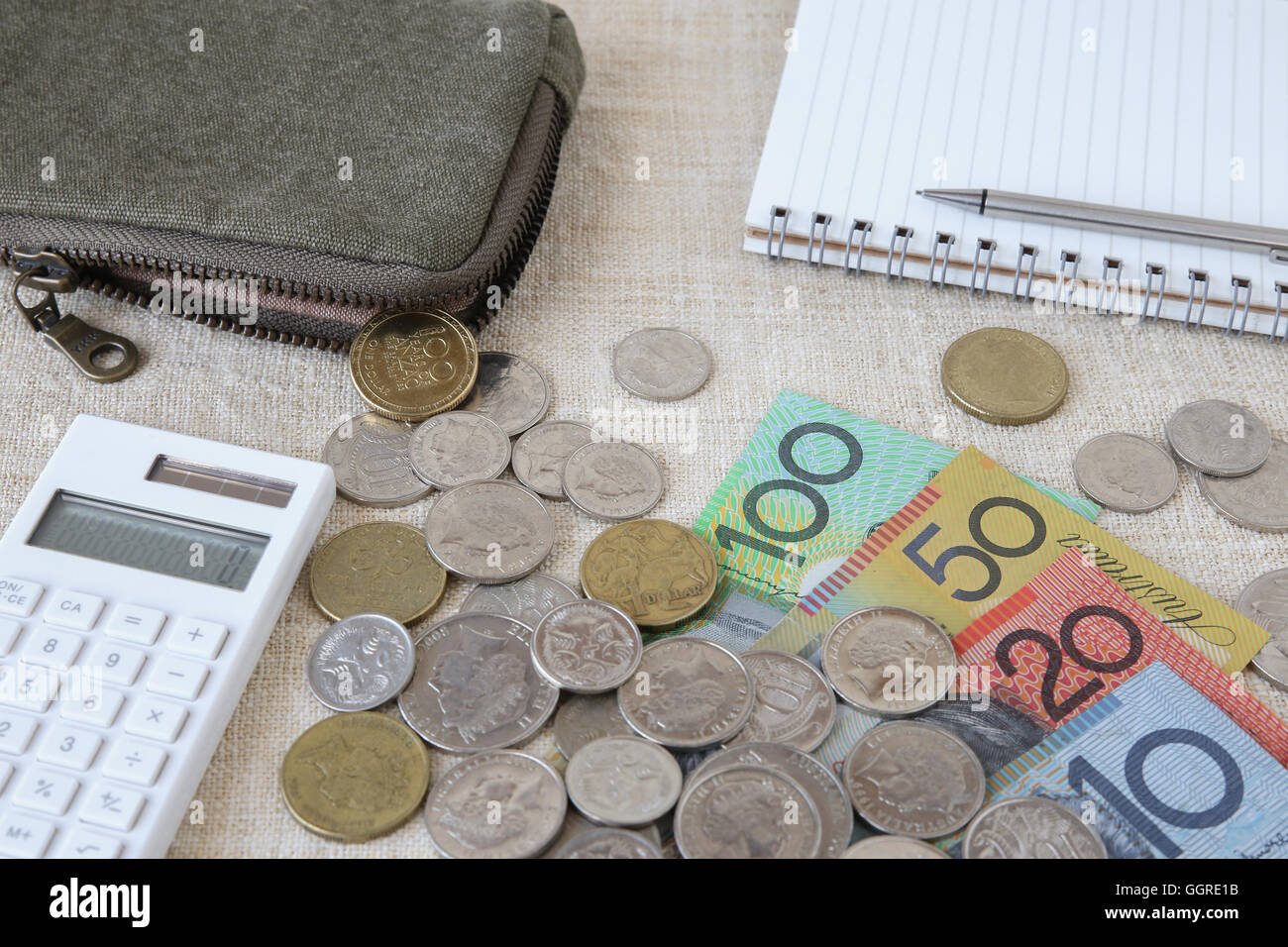 Australian money, AUD with calculator, notebook and small money pouch ...