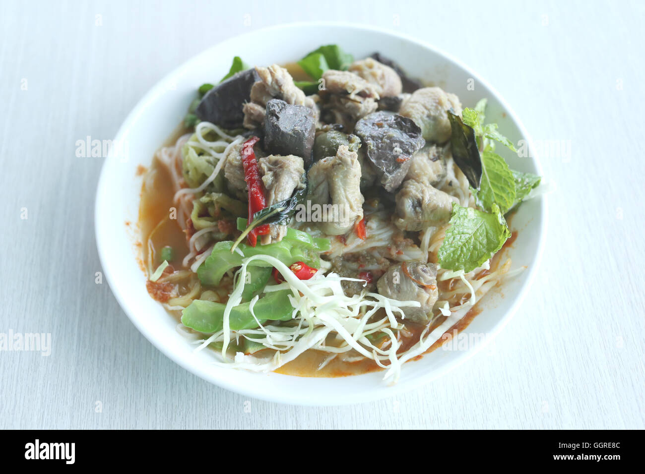 Curry chicken noodles (KHANOM CHIN) with vegetable,This is local Thai ...