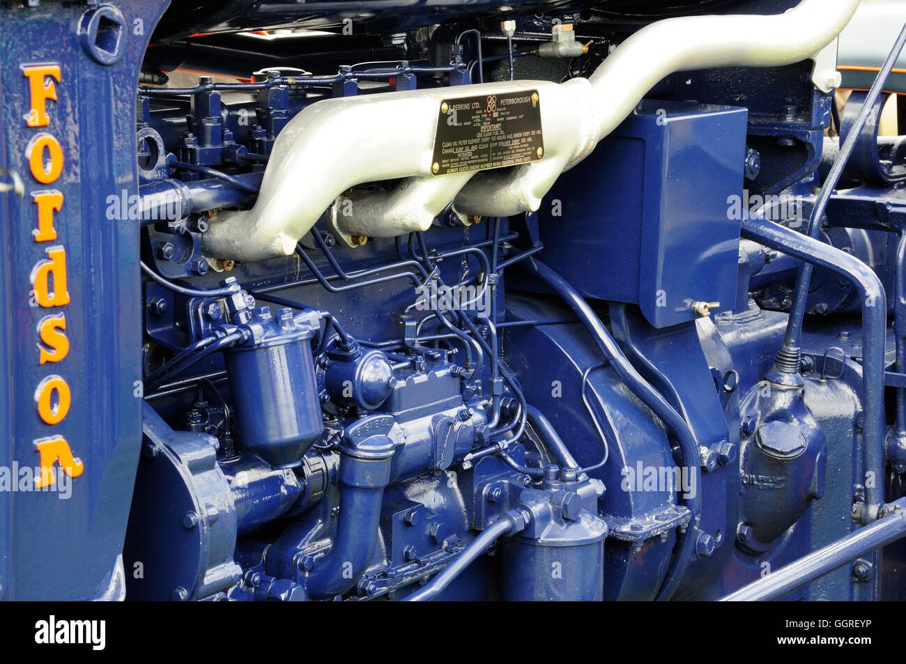 Engine and badge of a restore vintage Fordson tractor Stock Photo - Alamy